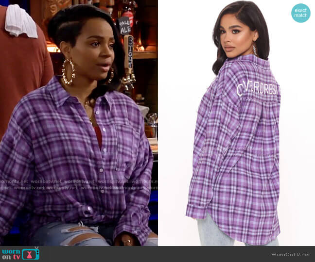 WornOnTV: Randi’s purple plaid shirt with OVERDRESSED on the back ...