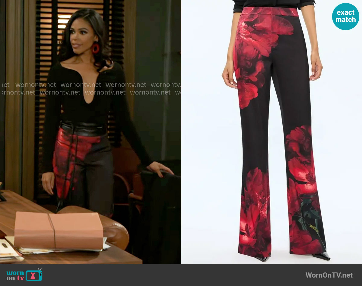 WornOnTV: Dani’s black plunge neck top and red floral pants on Beyond ...