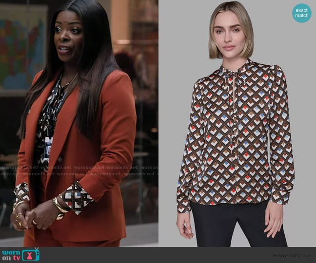 WornOnTV: Ava’s printed blouse and orange suit on Abbott Elementary ...